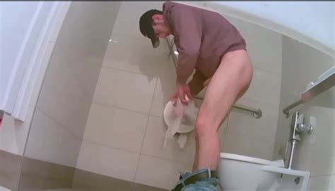 Toilet Spy Handsome Guy Stands And Wipes