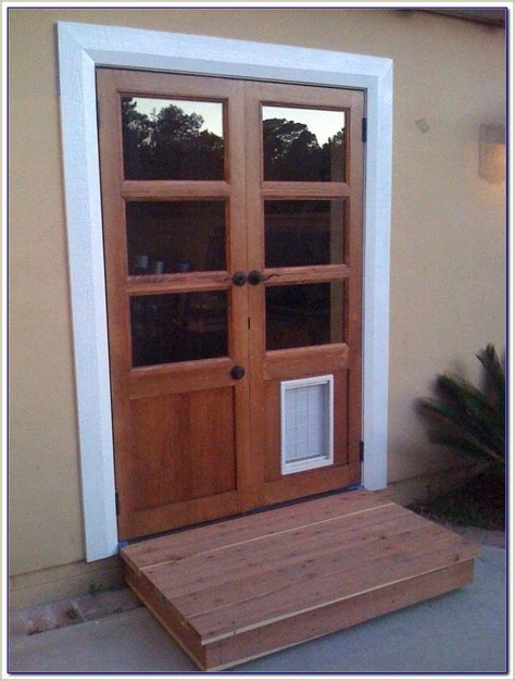 Center Hinged Patio Door With Dog Door Patio Home Design Ideas