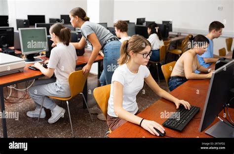 Portrait Of Female Babegirl At Computers In University Class Stock Photo Alamy