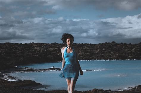 Premium Photo Dark Haired Model Is Posing With A Blue Lagoon On A