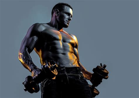 Premium Photo Sexy Muscular Body Strong Fit Man Exercising With