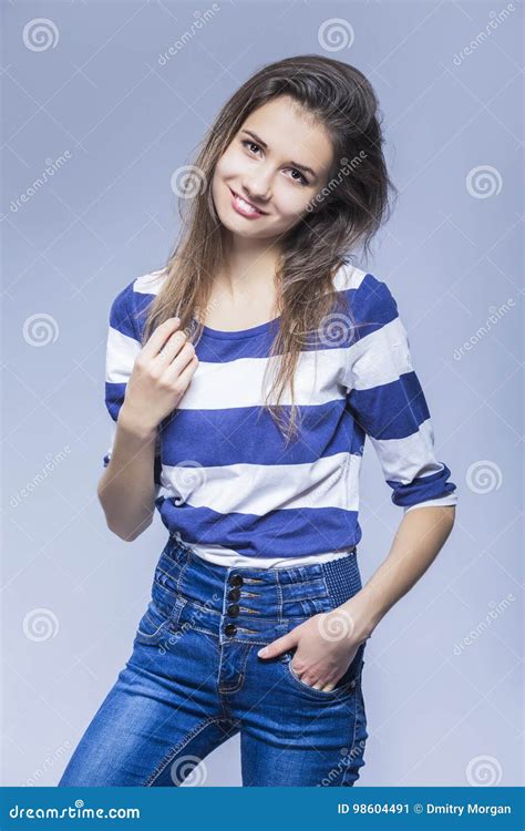 Natural Portrait Of Smiling Sensual Brunette Girl With Long Hair Posing