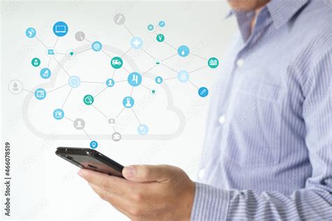 Man Holding Smart Phone With Virtual Cloud Computing On Hand With Connection Linecloud