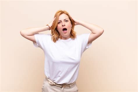 Premium Photo Portrait Of A Woman Looking Surprised