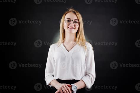 Studio Portrait Of Blonde Businesswoman In Glasses White Blouse And