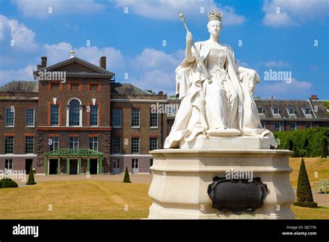 The Impressive Statue Of Queen Victoria Situated Outside Kensington Palace In London Stock Photo