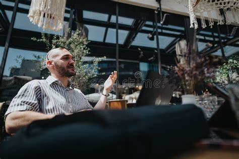 Startup Team In Business Meeting Discussing Brainstorming Analyzing And Strategizing Ideas Stock