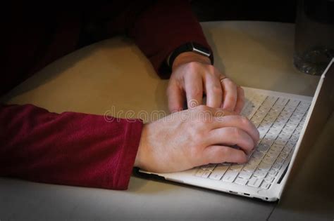 Adult Typing On Laptop Notebook Device Wearing Fitness Watch Technology Remote Work Background