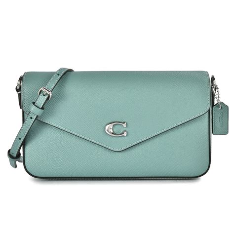 Coach 專櫃款 Wyn 質感素面防刮皮革信封式斜背包附萬用收納夾 粉藍綠色 斜背包 Yahoo奇摩購物中心