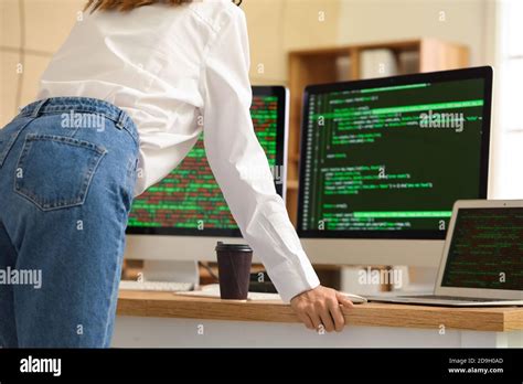 Female Programmer Working In Office Stock Photo Alamy