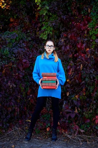 Premium Photo Girl With Glasses And Books Autumn