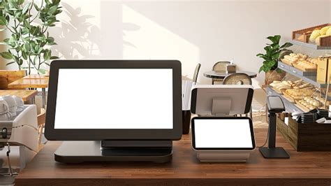 현대적이고 고급스러운 카페와 베이커리의 나무 카운터에 태블릿과 바코드 리더가 있는 빈 컴퓨터 터치 스크린이 있는 디지털 금전 등록기의 클로즈업 금전 등록기에 대한 스톡 사진