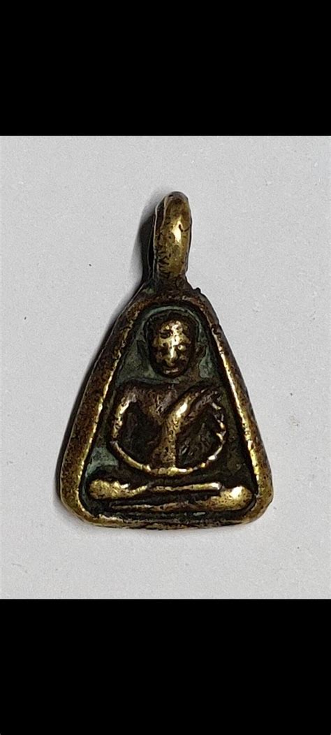 เหรียญจอบเล็กหลวงพ่อเงินวัดบางคลาน Ennxo