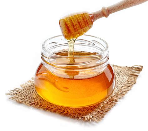 蜂蜜图片 金黄的蜂蜜和和旁边的蜂蜜素材 高清图片 摄影照片 寻图免费打包下载