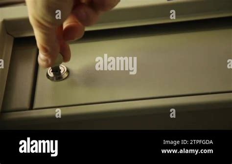 Key Unlocked A Safe Latch And Opening Door Safety Deposit Box Man Folds Documents And Pc Tablet