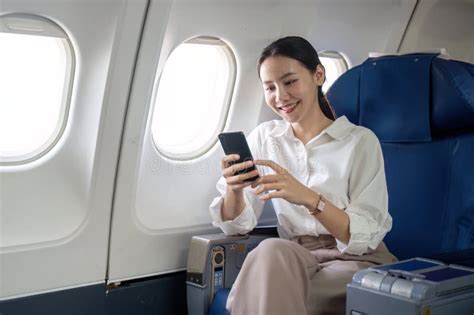 Traveling And Technology Flying At First Class Stock Image Image Of Cellular Holding 311757779