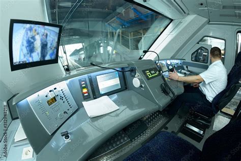 At The Cabin Of The Passenger Train Train Driver Sitting Of Locomotive