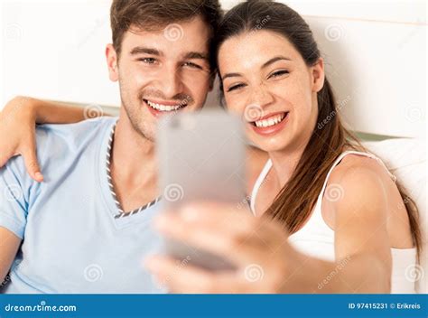 Couple On Bed Making Selfies Stock Image Image Of Indoors Camera