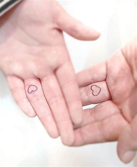Inner Finger Heart Tattoos
