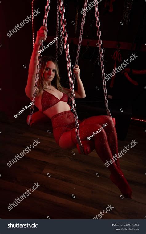 Female Posing On Chain Red Leather Stock Photo Shutterstock