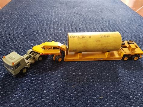 Conrad 150 Man Tractor With Low Loader Catawiki