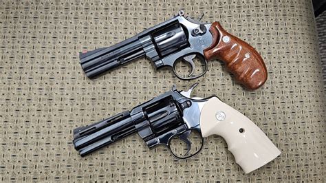 Smith And Wesson 586 Vs Colt Trooper Python Youtube