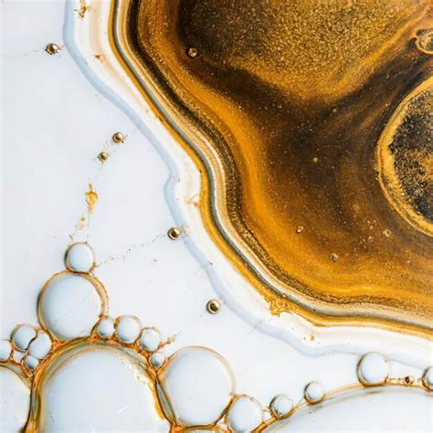 Premium Photo Abstract Gold And Beige Bubble Blot And Drops
