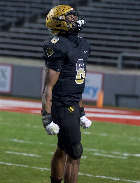 Black High School Football Player