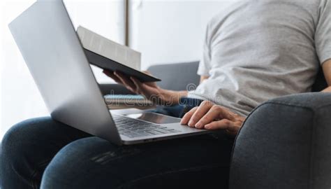 University Student Using Laptop Or Computer For Studying Or Learning