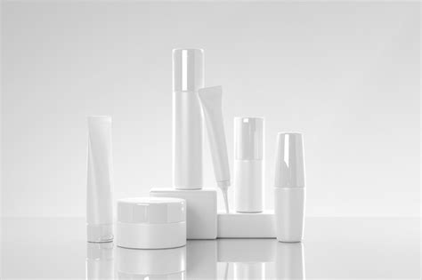 연단 모형 배너의 3d 우유 화장품 현실적인 스킨 케어 화장품 세트 3d 렌더링을 홍보하기 위해 스튜디오 배경에 크림이 있는 고급 흰색 광택 병 튜브 및 항아리 프리미엄 사진