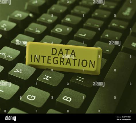 Hand Writing Sign Data Integration Word Written On Involves Combining Data Residing In