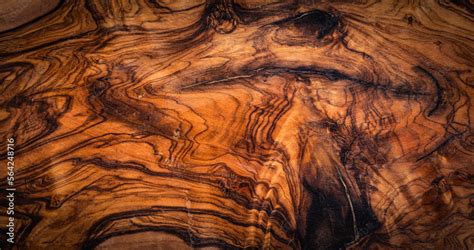 Texture Of Dark Brown Olive Wood Plank Background Of Wooden Surface