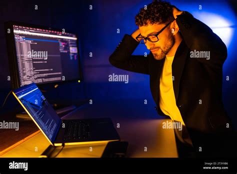 Photo Of Serious Professional Programmer Look Camera Improving Debugging Service Experience Dark