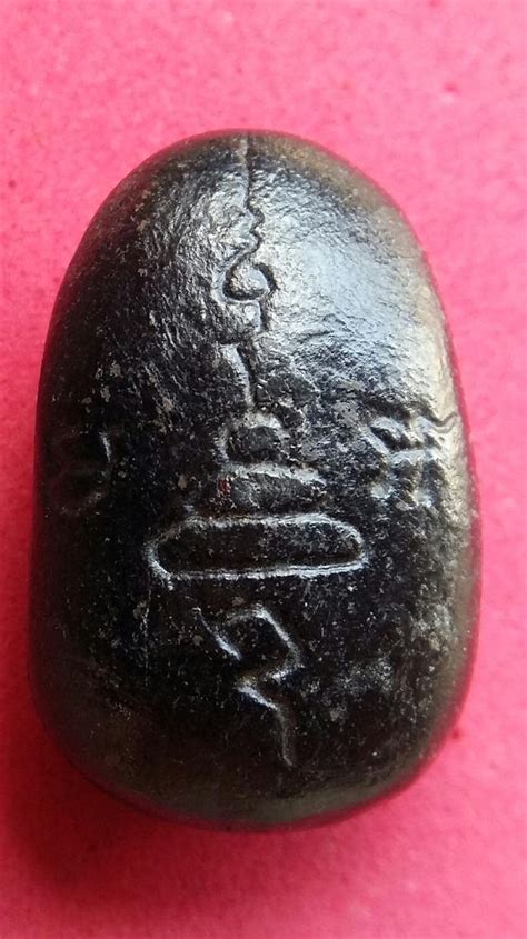 พระปิดตาเนื้อผงคลุกรัก หลังยันย์ หลวงปู่ไข่ วัดเชิงเลข Ennxo