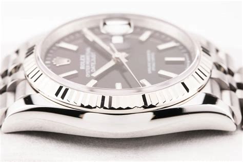 Rolex Datejust 36 Black Stick Dial Fluted Jubilee 126234 — Watch