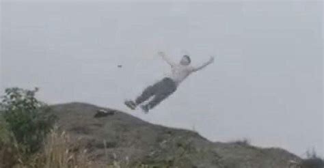Girl Jumping Off A Cliff