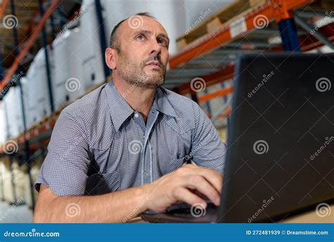 Manager Using Laptop In Warehouse Stock Image Image Of Adult