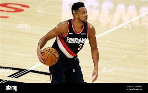Portland Trail Blazers Guard Cj Mccollum Dribbles During An Nba