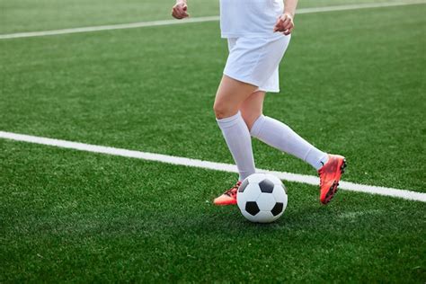 Premium Photo Sports Girl Football Player With A Soccer Ball On The