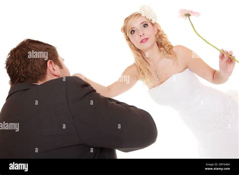 Wedding Day Male Groom Kissing Hand Of Female Bride Isolated On White