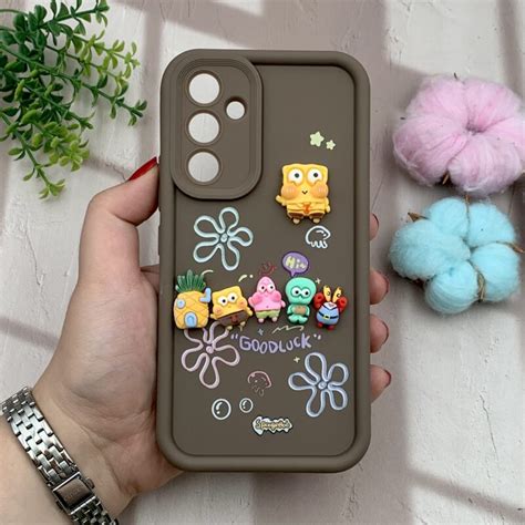 قاب گوشی Galaxy A54 سامسونگ سیلیکونی Solid Case اورجینال خانواده پاتریک و باب اسفنجی قهوه ای