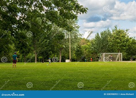 Father Playing Soccer With Son In The Lafond Park Editorial Photo