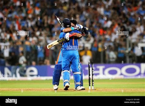 Mahendra Singh Dhoni Right Hugs Yuvraj Singh To Celebrate Icc Cricket