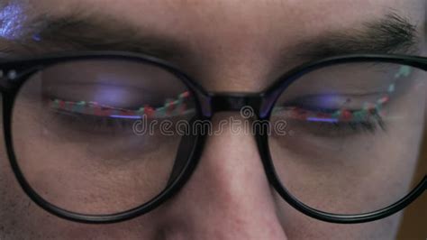 Close Up Of Businessman Trader Wearing Eyeglasses Looking At A Computer