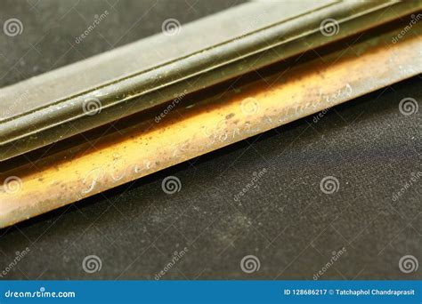 Old Brass Ruler Editorial Photo 128686217