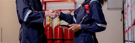 Electrical Babe Woman And Man Engineer Examining Maintenance Cabinet System Electric And