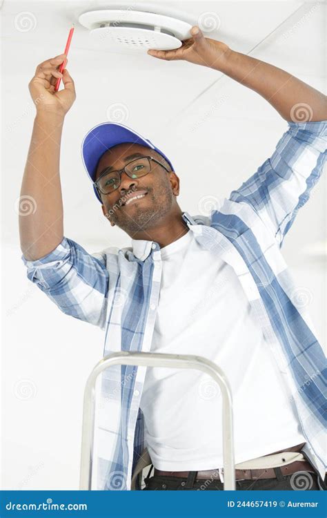 Man Mounting Ceiling Lamp Stock Image Image Of Power 244657419