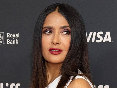 Salma Hayek Strikes A Sassy Pose In Sultry Body Hugging Gown On Red