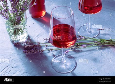 Rose Wine Glasses And Lavender Flowers Tasting The Wines Of Provence
