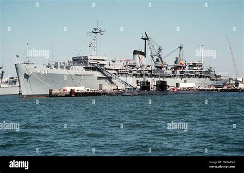 A Port Bow View Of The Submarine Tender Uss Hunley As 31 Moored At